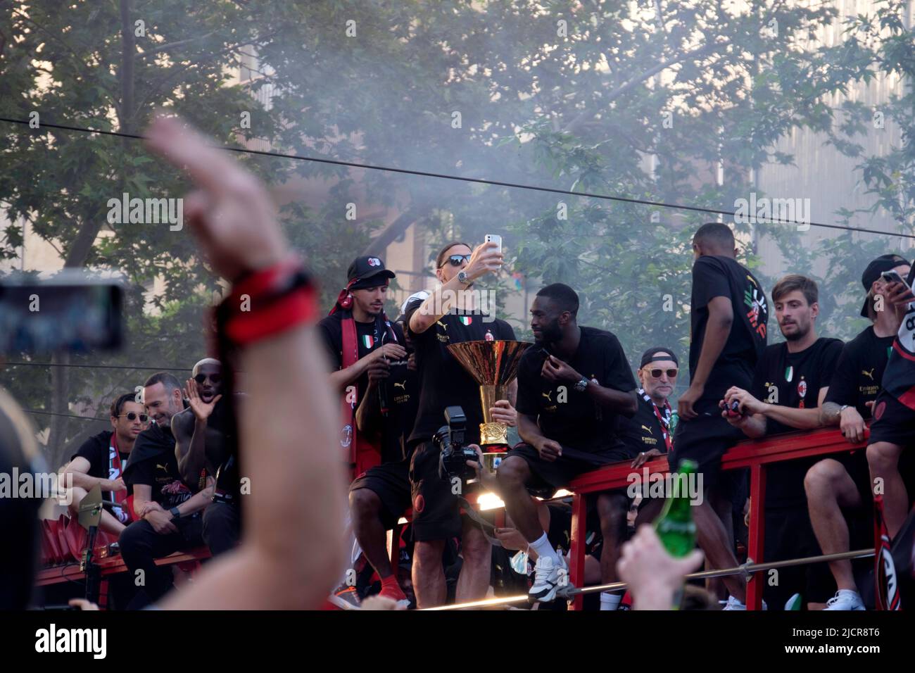 The AC Milan players parade through the corso Sempione in Milan to ...