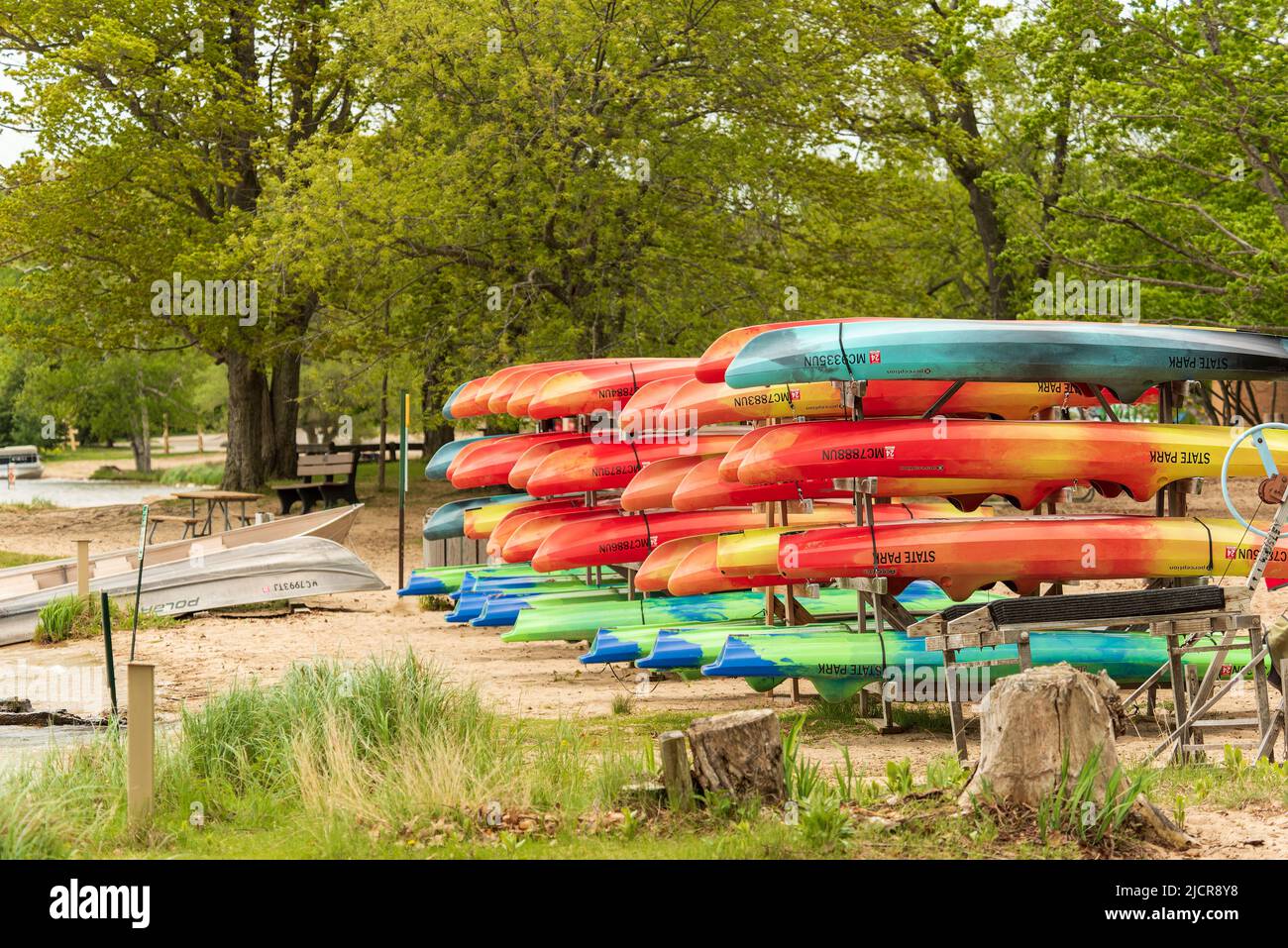 Ludington, MI - May 21, 2022: Colorful rental kayaks stored on a beach ...