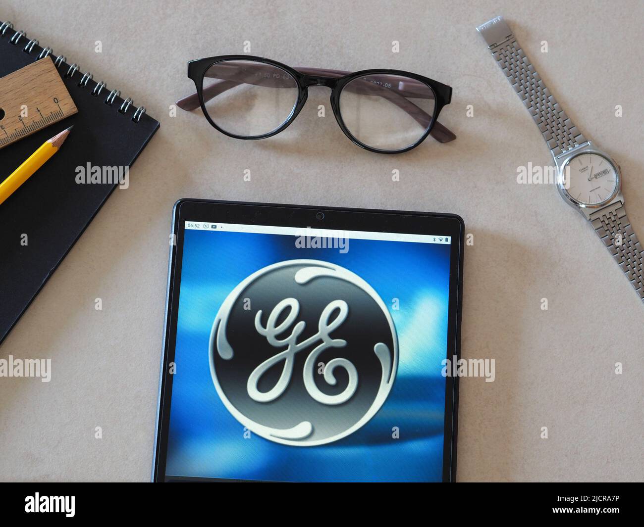 In this photo illustration, a General Electric (GE, General Electric ...