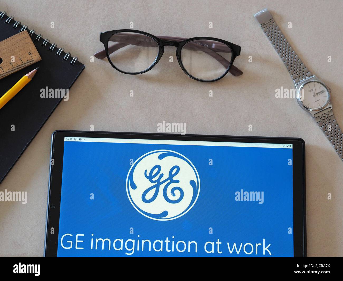 In this photo illustration, a General Electric (GE, General Electric ...