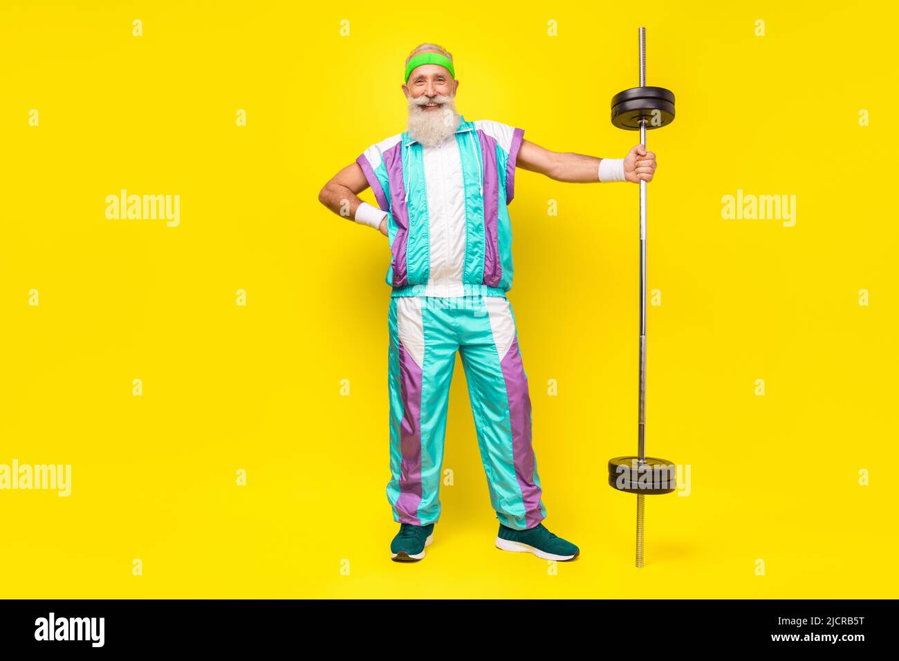 Full body photo of cheerful aged person put hand waist hold barbell ...