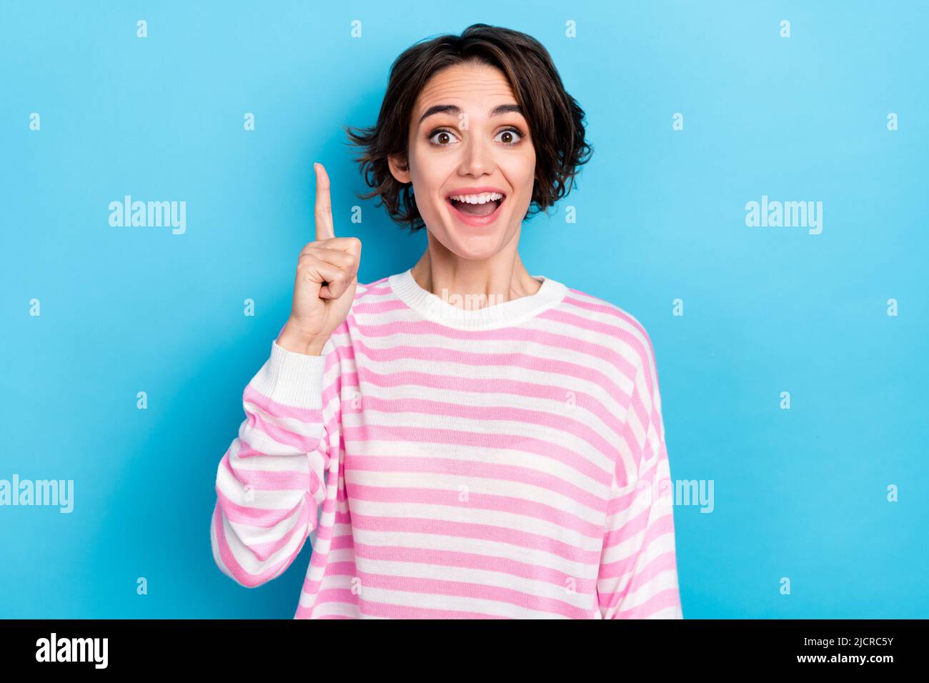 Photo of good looking cheerful young girl find solution smart head ...