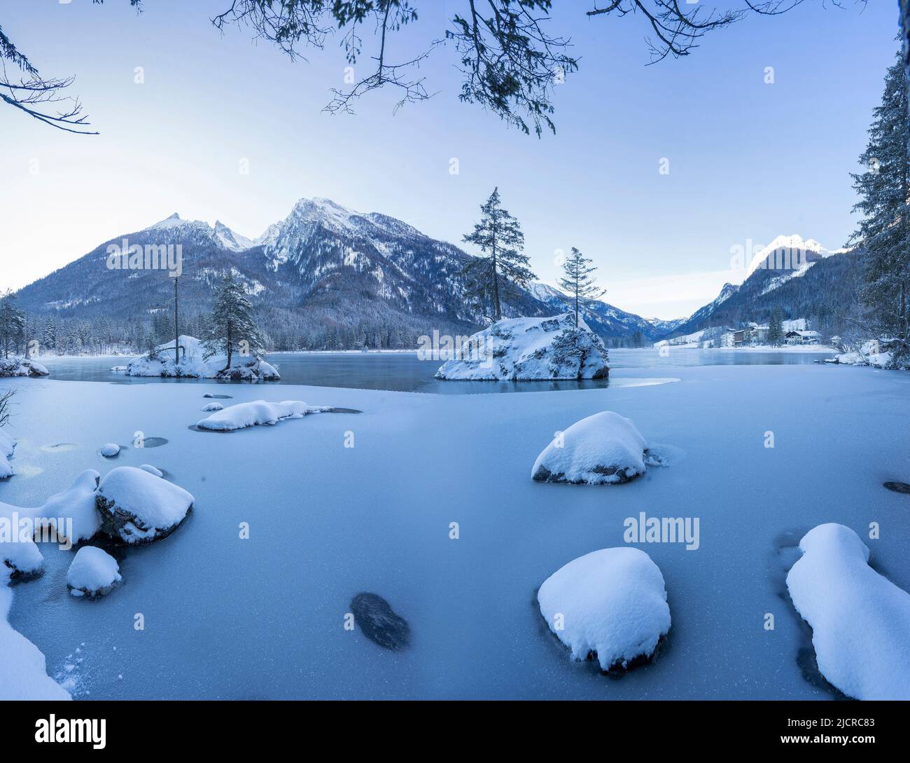 Lake Hintersee in winter with the peaks Blaueisspitze and Hochkalter in ...