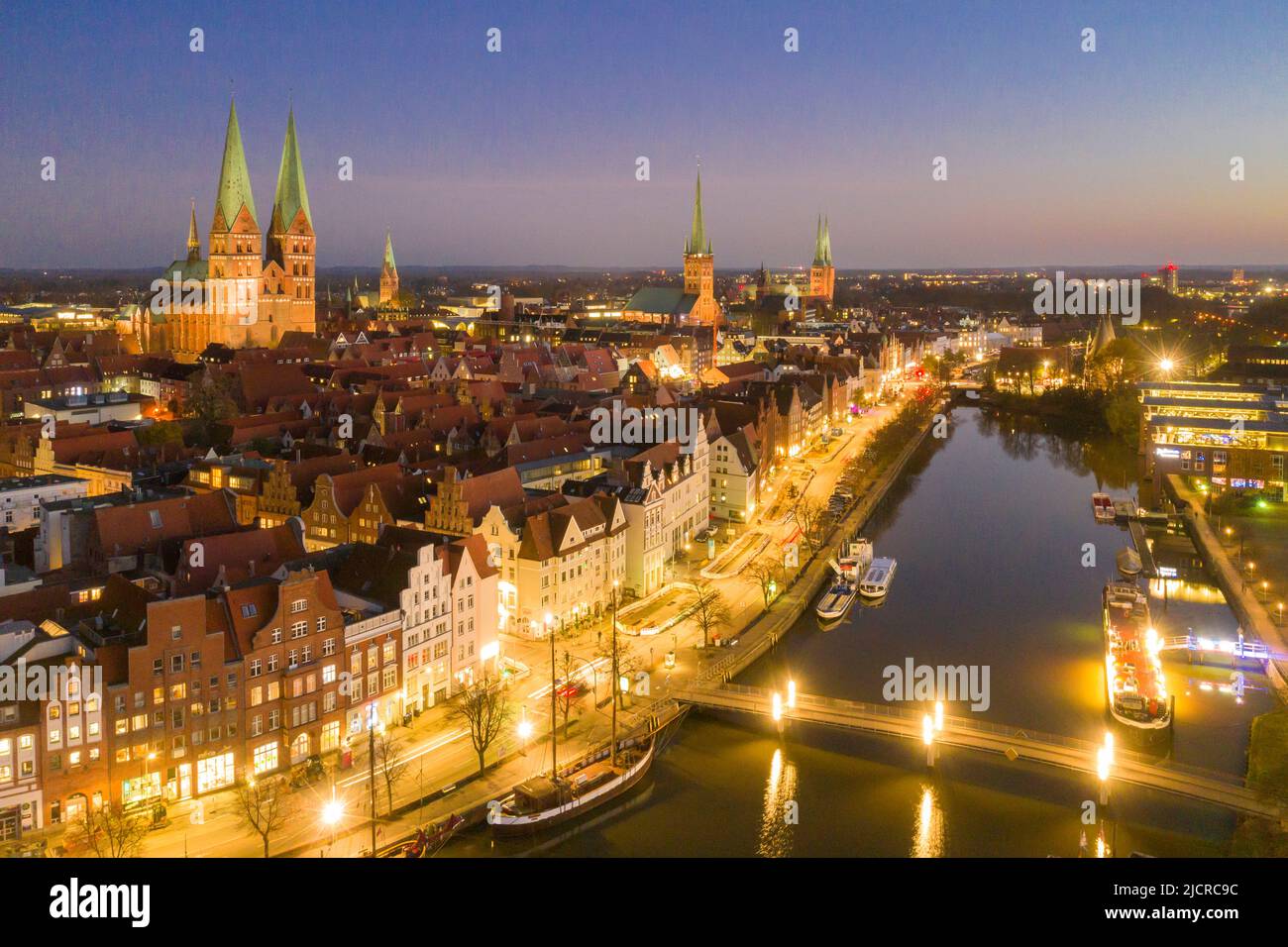 Old town and river Trave in the evening. Luebeck, Germany Stock Photo ...