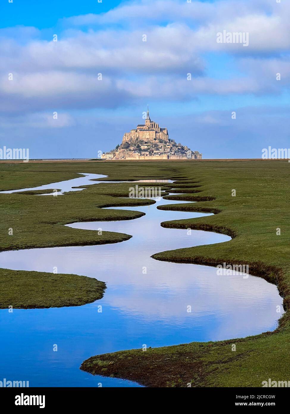Salt marsh and Mont Saint-Michel landscape in normandy during sunny and ...