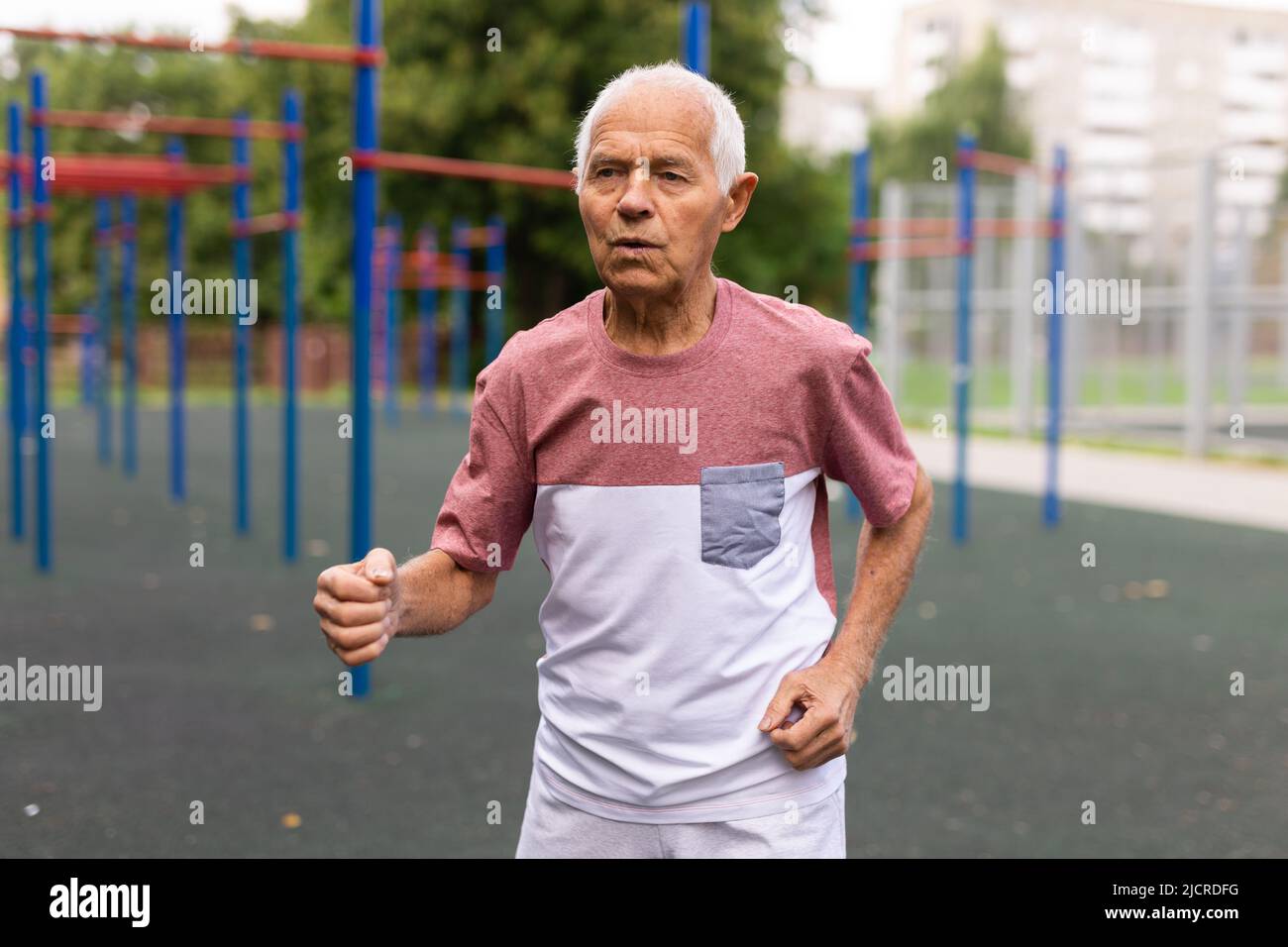 Elderly men running hi-res stock photography and images - Alamy