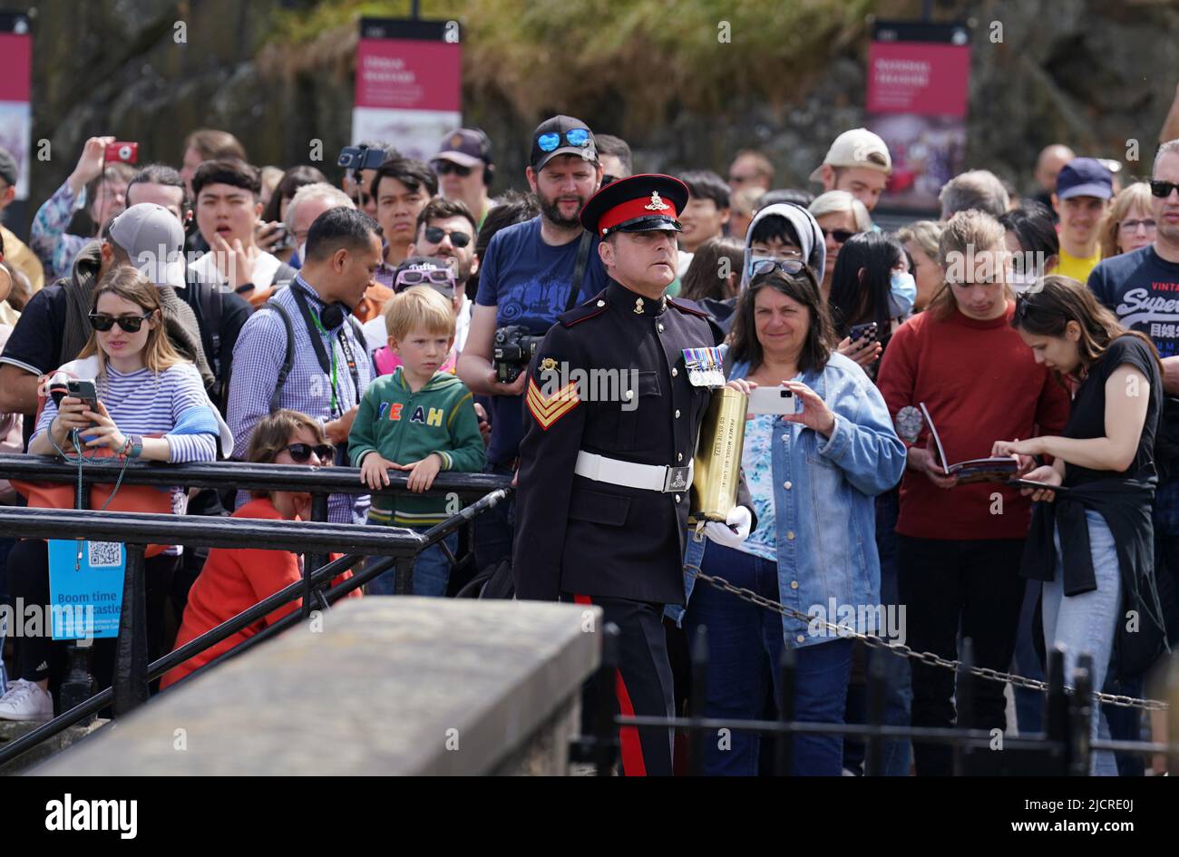 District Gunner Sgt David Beveridge carrys the cartridge as he prepares ...
