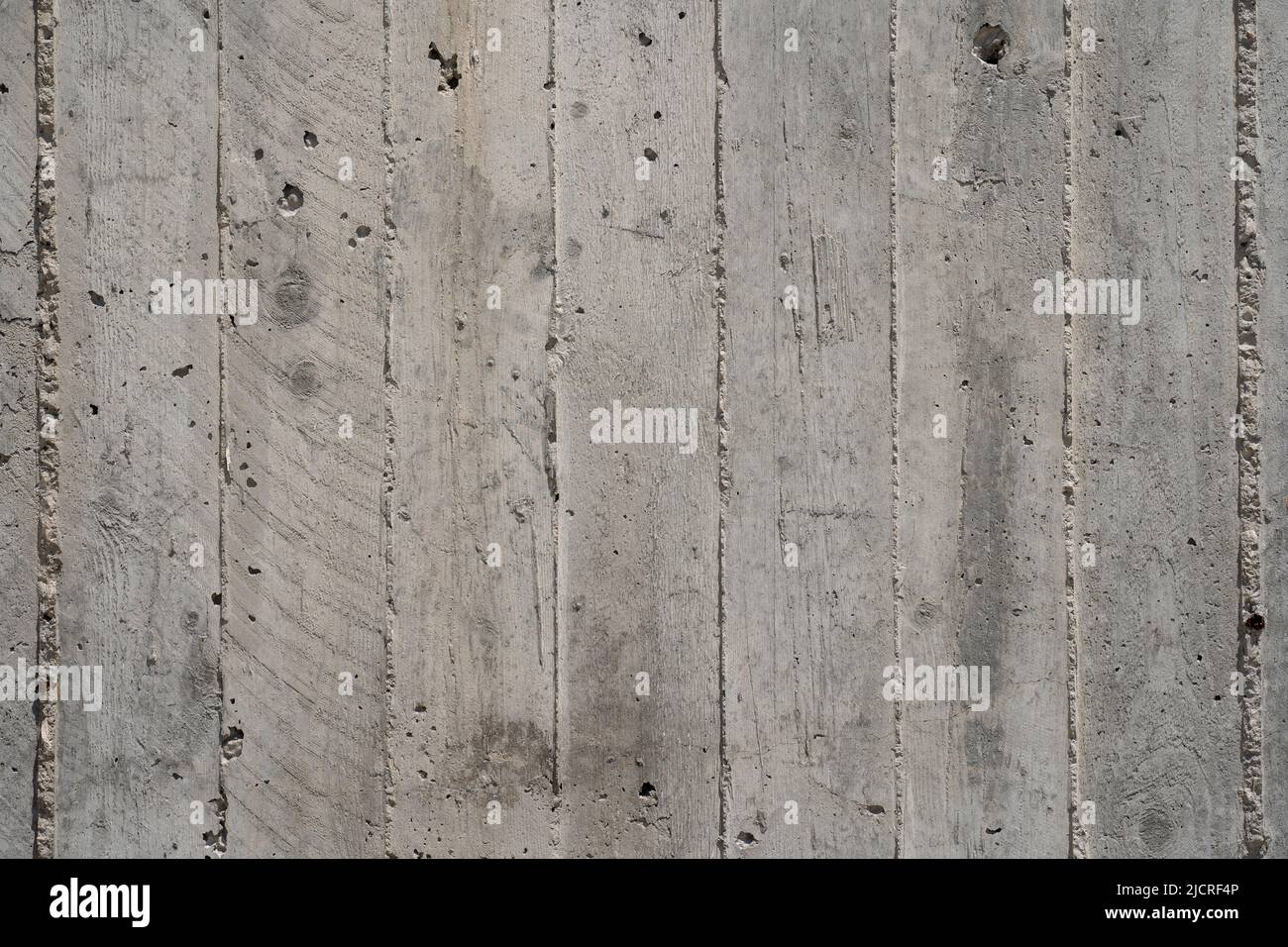 Grey concrete wall texture with vertical lines and cracks Stock Photo ...