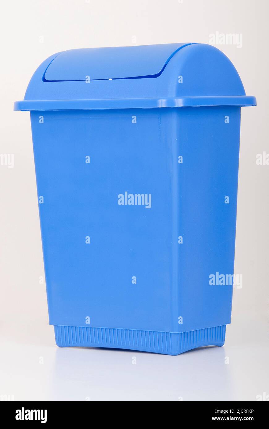 Blue plastic garbage container on white background Stock Photo - Alamy
