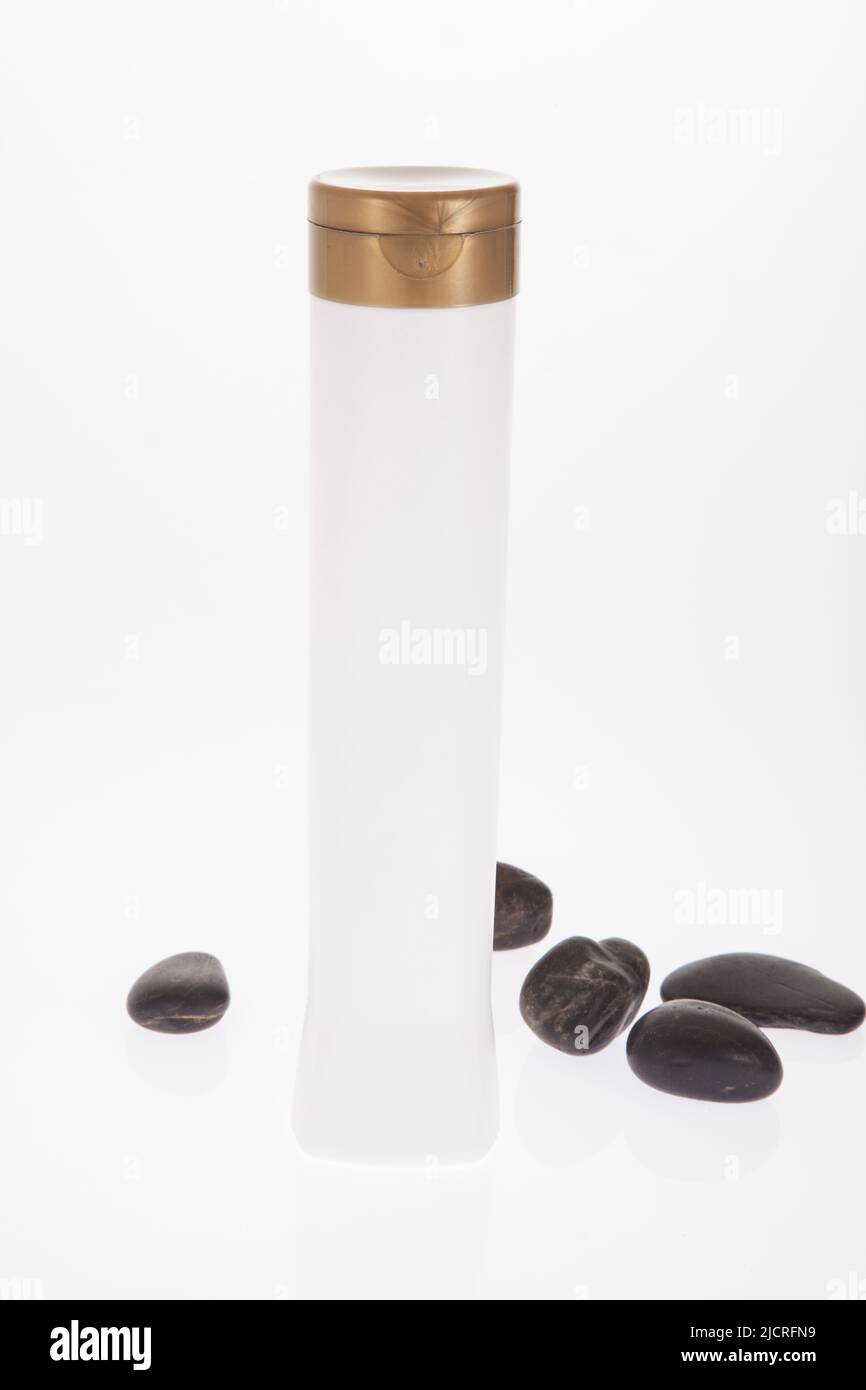 Multipurpose container; white plastic jar with golden lid - photo on ...