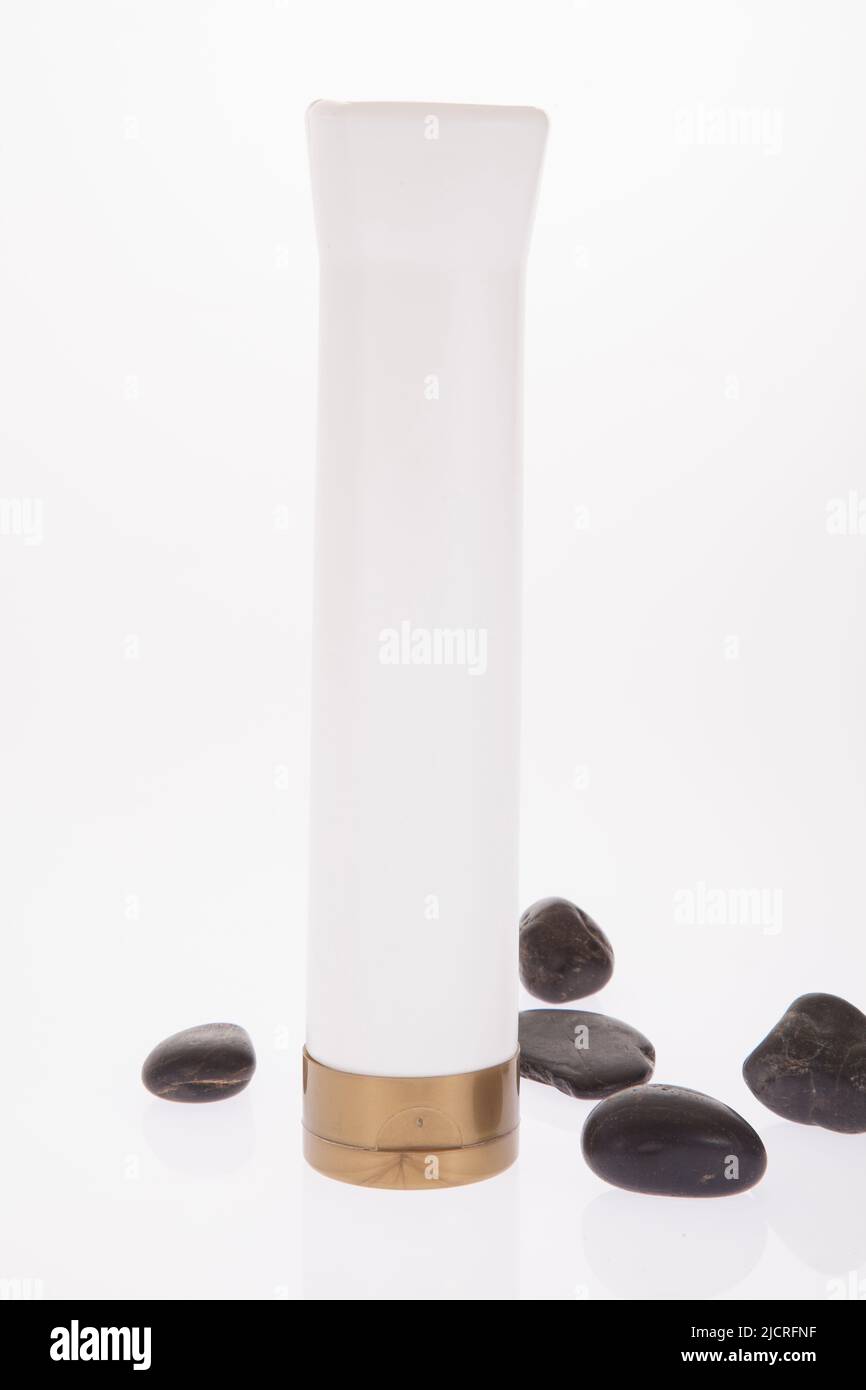 Multipurpose container; white plastic jar with golden lid - photo on ...