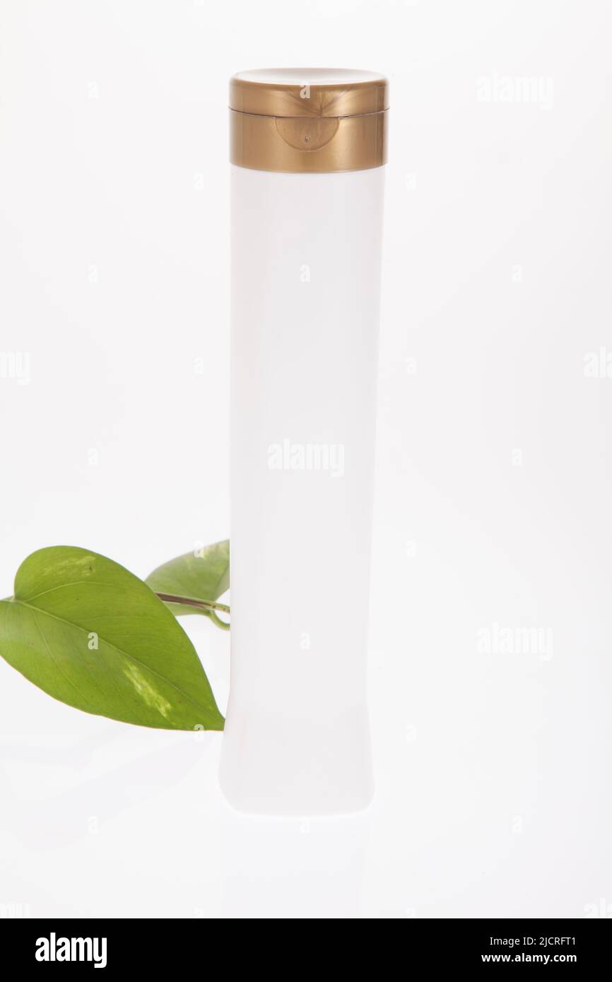 Multipurpose container; white plastic jar with golden lid - photo on ...