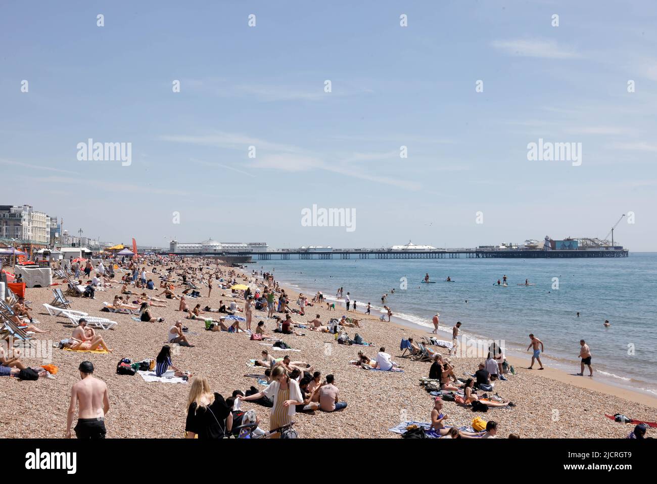 City of Brighton & Hove. UK Another balmy sunny day on Brighton Beach ...