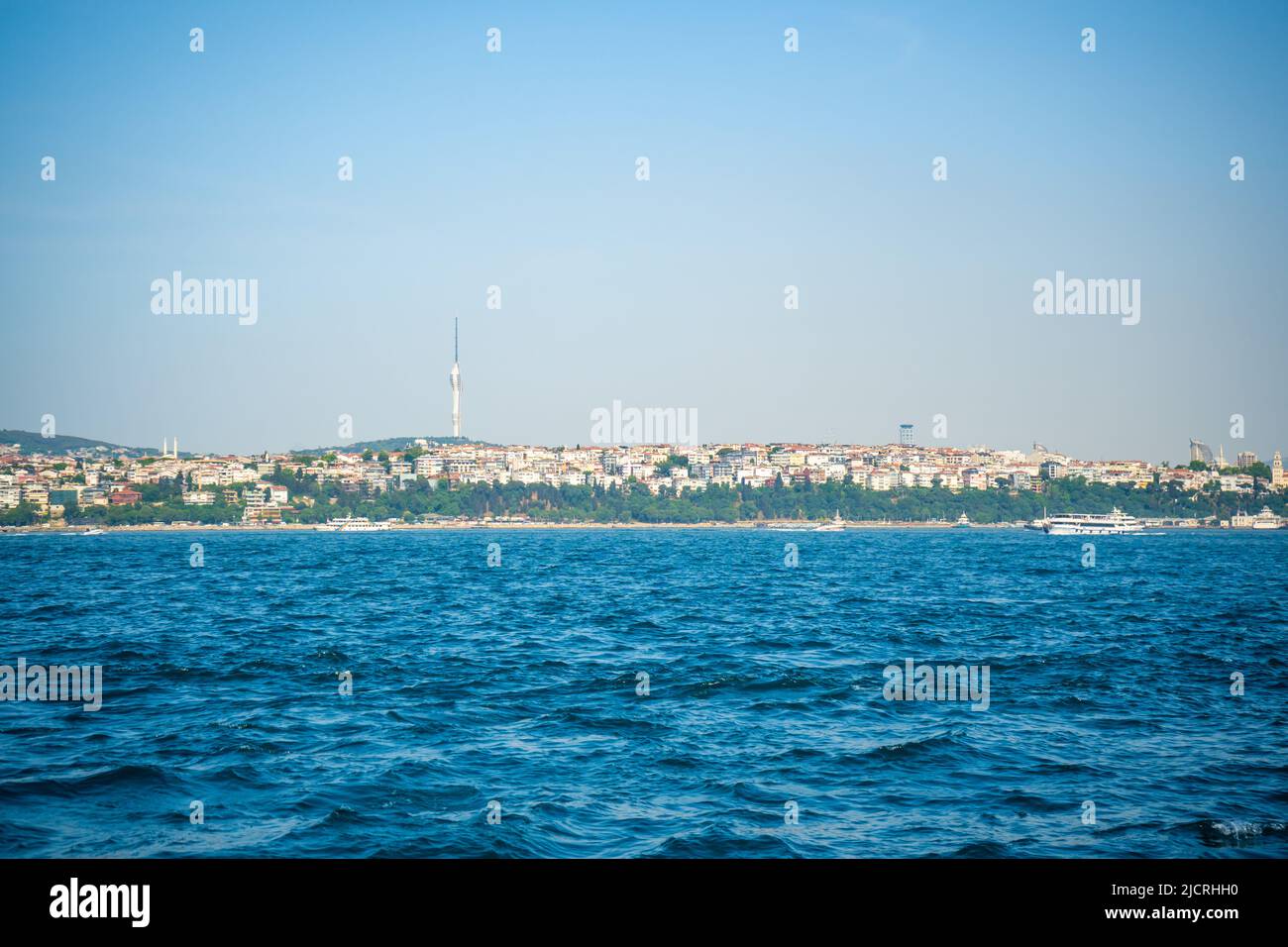 View of the embankment, water and ships in the city of Istanbul on a ...