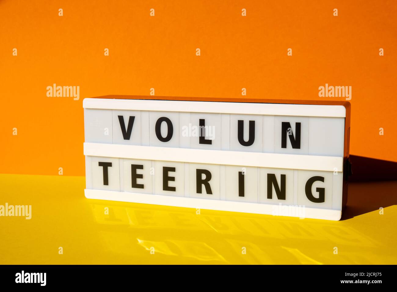 Lightbox with text VOLUNTEERING. Motivational Words Quotes Concept ...