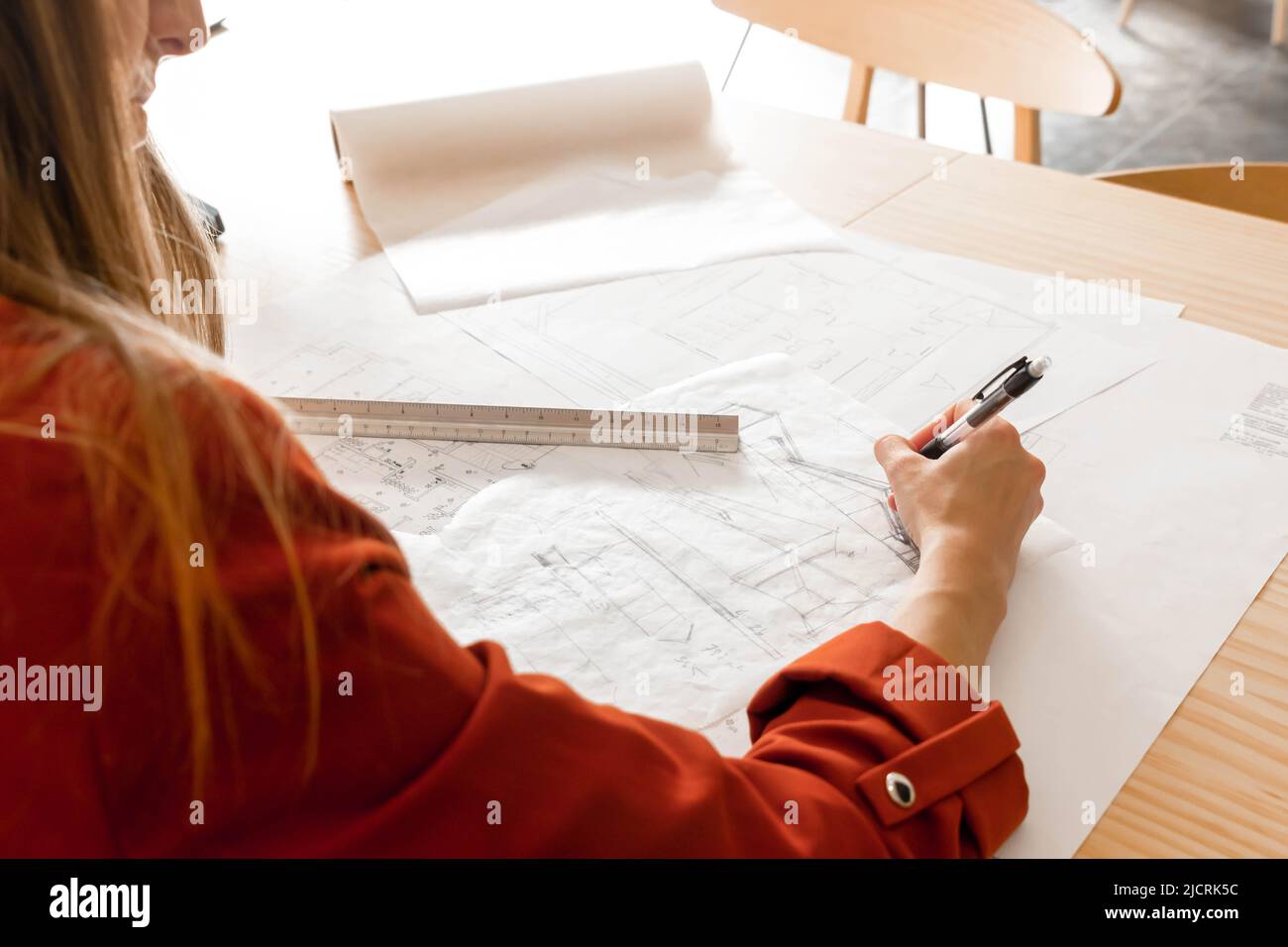 Interior designer woman calculator hi-res stock photography and images ...