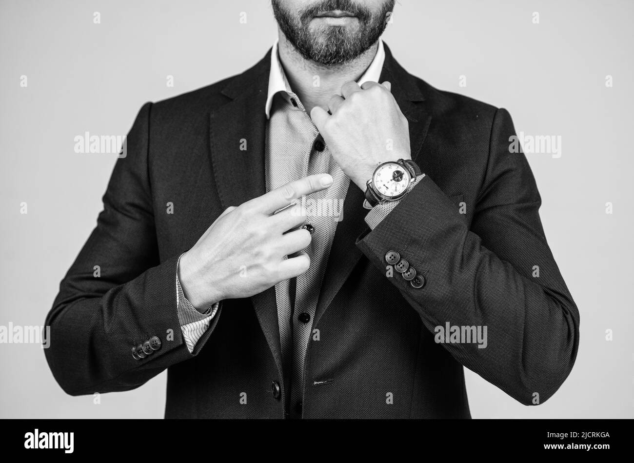 Person pointing watch wrist Black and White Stock Photos & Images - Alamy