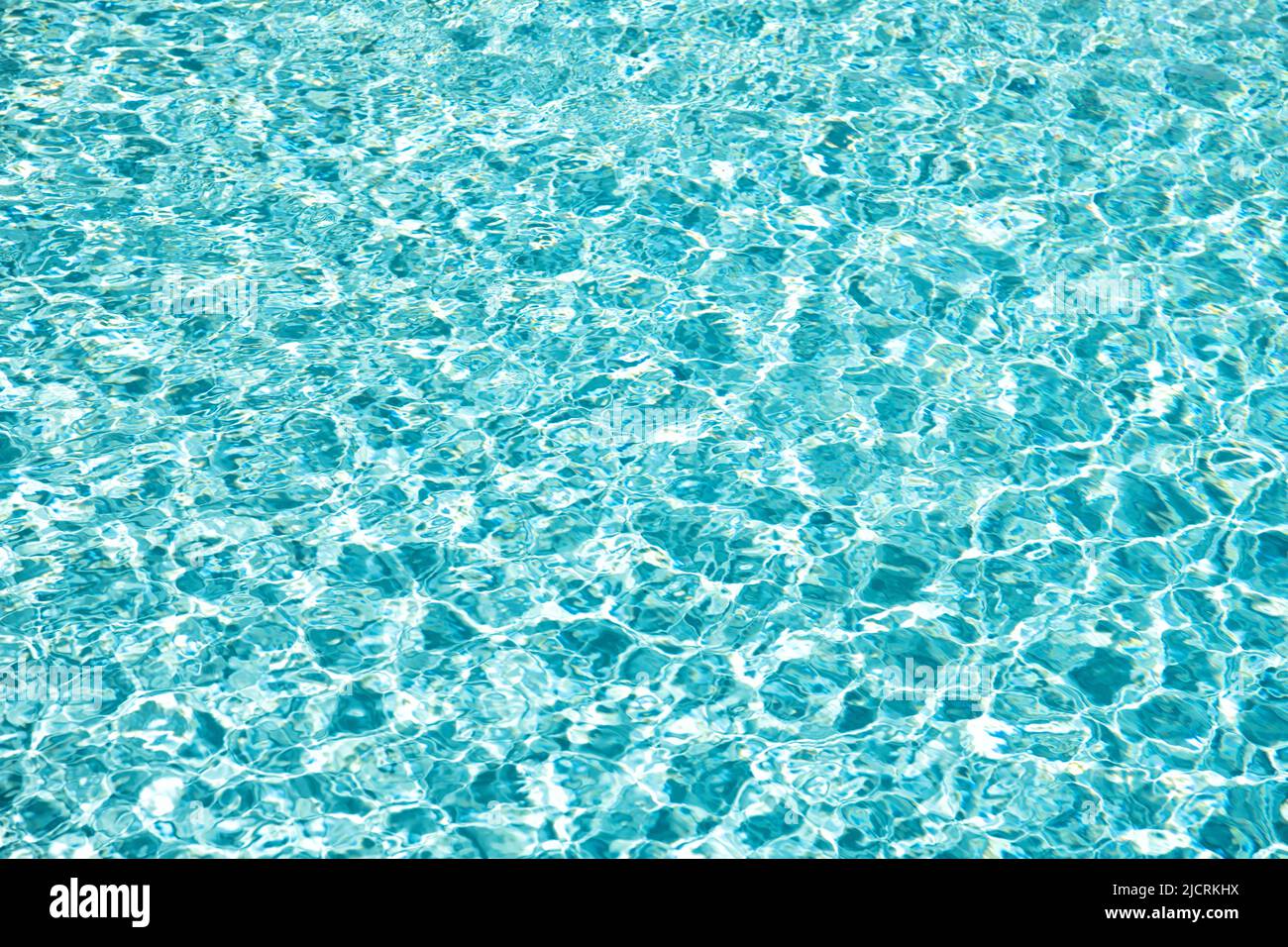 blue swimming pool water background with waves Stock Photo - Alamy
