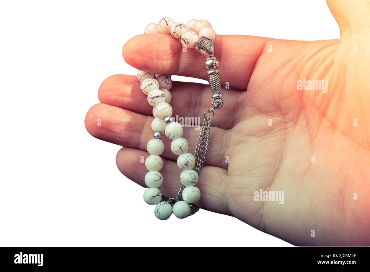 Hand with prayer beads isolated on white background Stock Photo - Alamy
