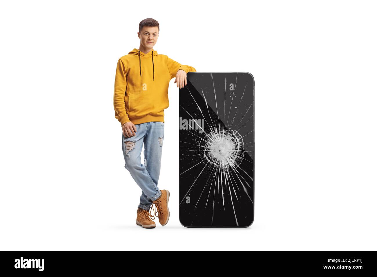 Guy leaning on a big mobile phone with crushed screen isolated on white ...