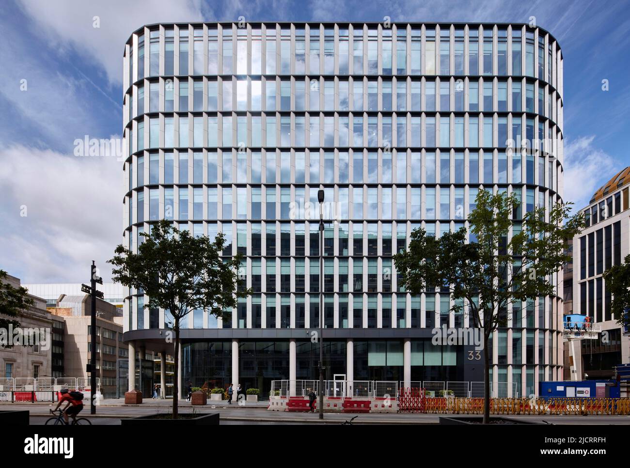 Exterior street facade of the new commercial building - front view. 33 ...
