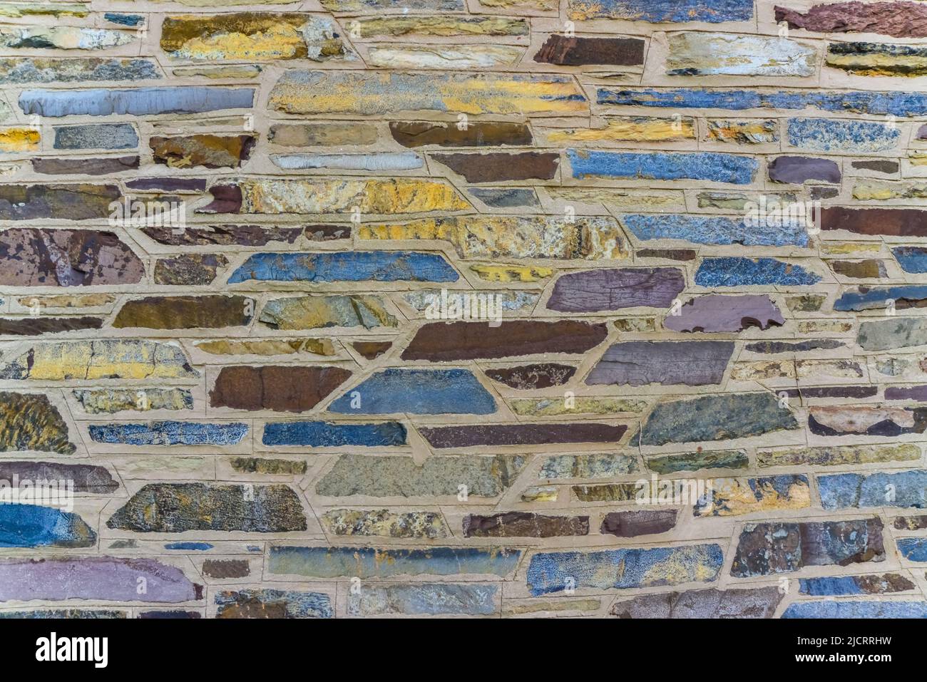 Antique brick wall made of natural stone. Princeton University ...