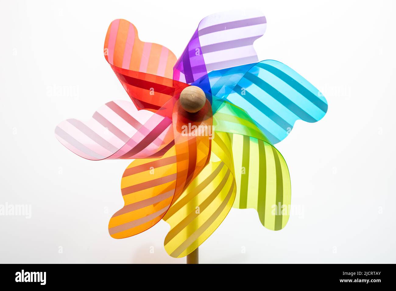 Pinwheel isolated on white background. Rainbow color windmill toy on a ...