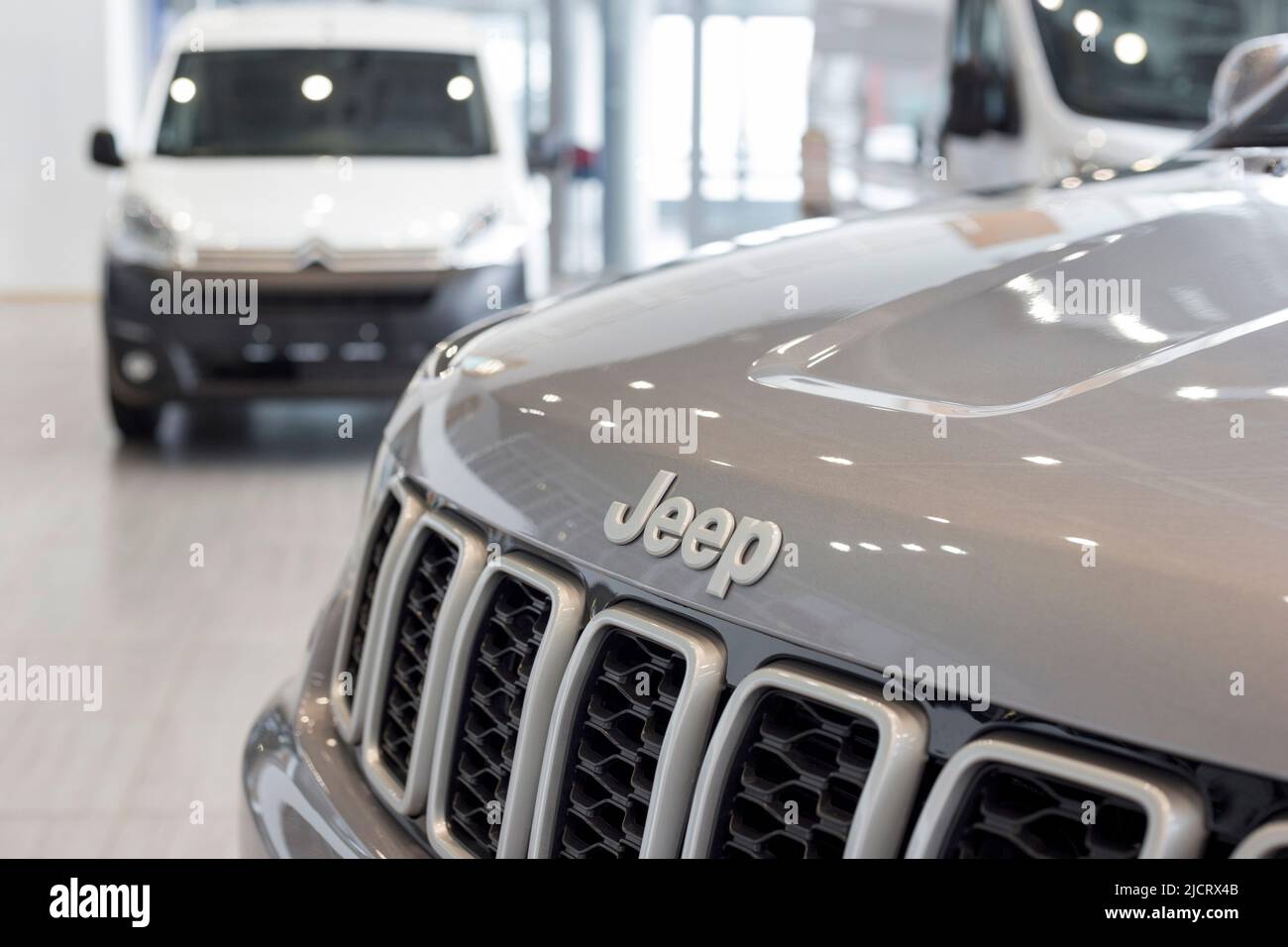 Russia, Izhevsk - March 4, 2022: Jeep showroom. Jeep logo on a bumper ...
