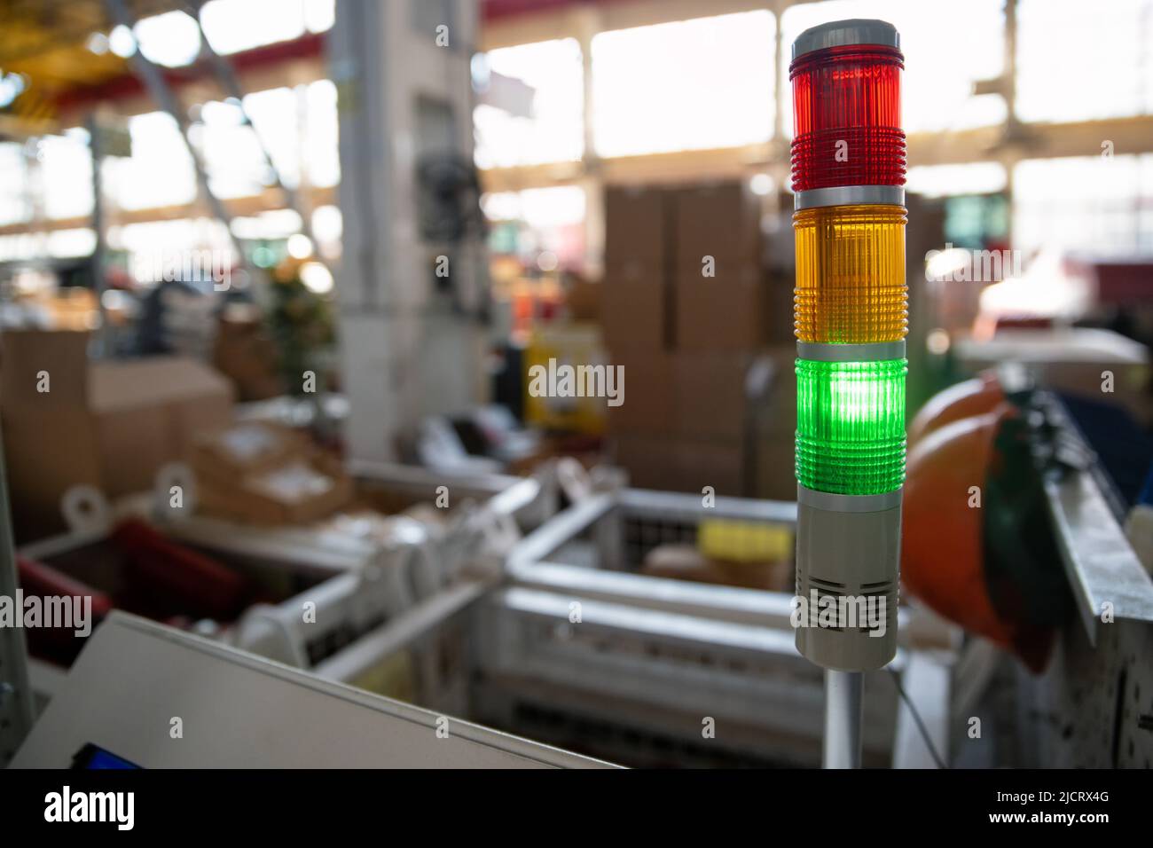 Industrial modular signal indicator. Red, yellow and green. Green light ...