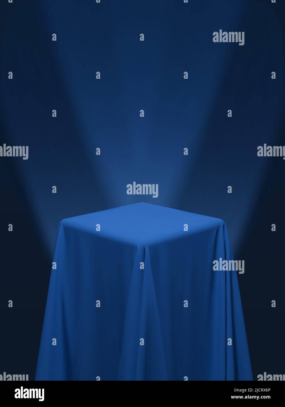 Blue fabric covering a cube or a table, with blue background and stage ...