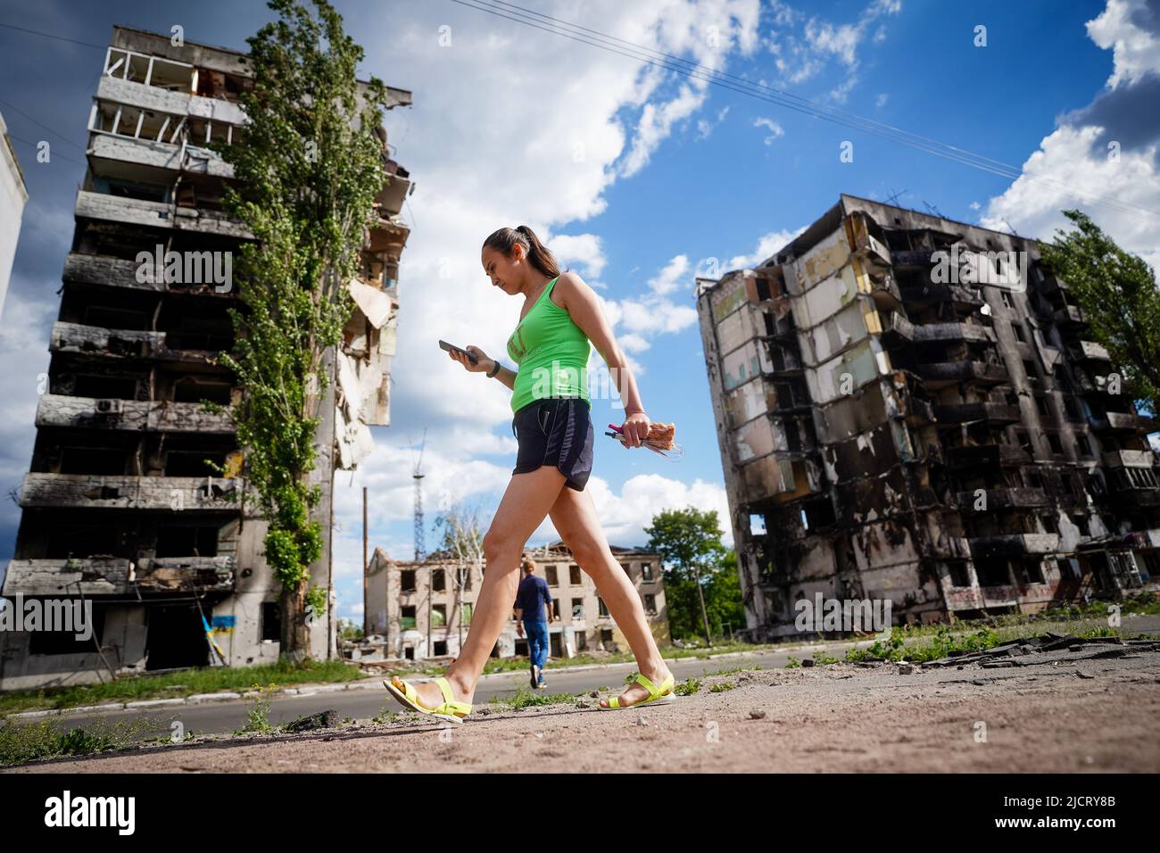 Ukraine destroyed buildings 2022 woman hi-res stock photography and ...