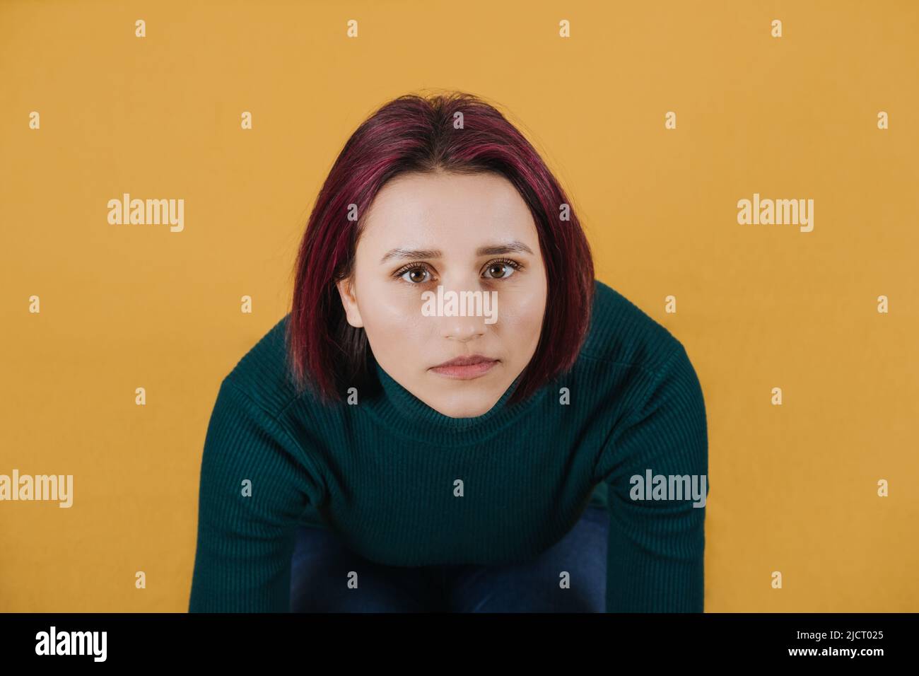 Studio portrait of unhappy young woman. Anger, Anxiety, Bipolar ...