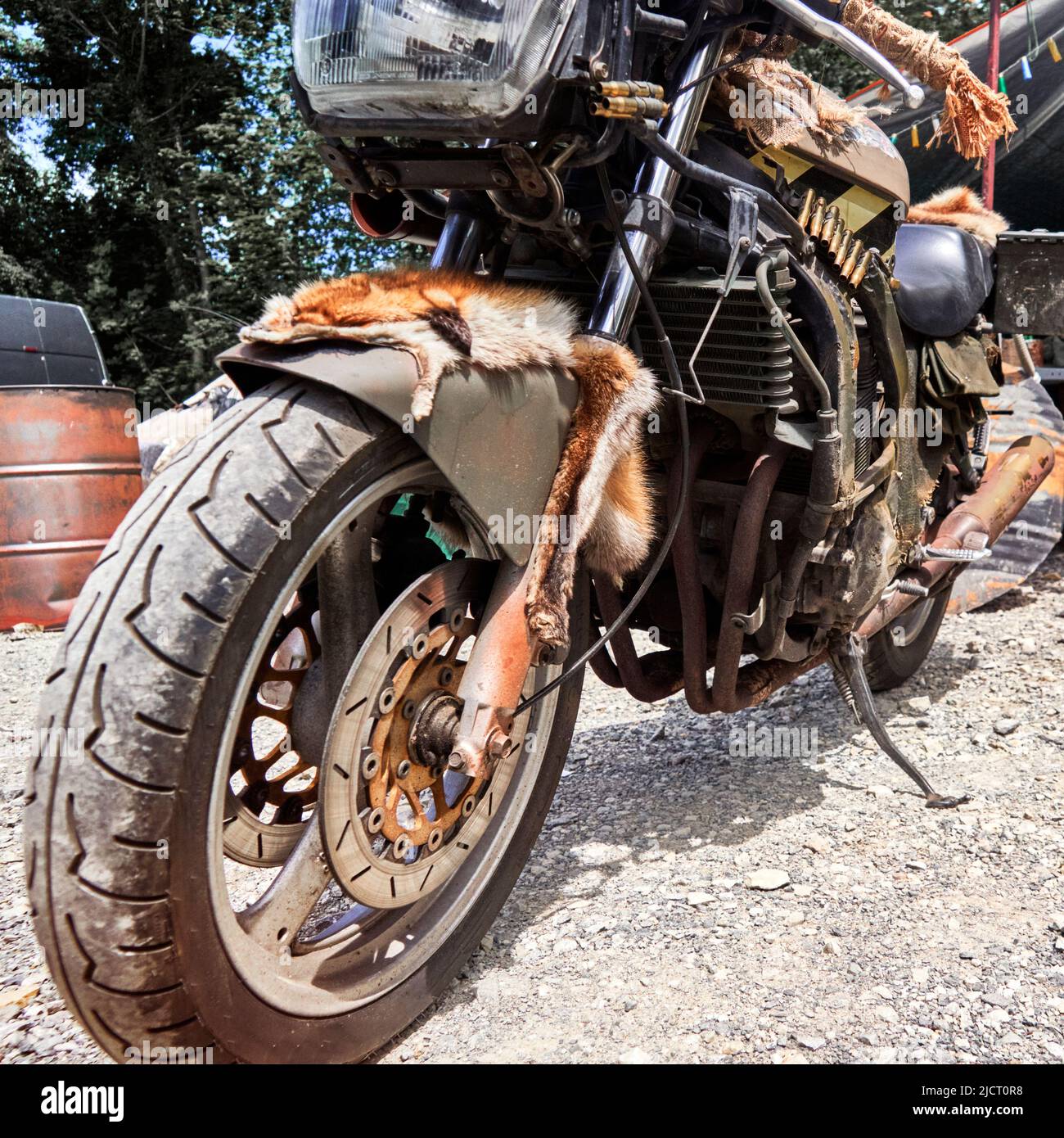 Rusty end time motorcycle decorated and dressed up with skins of small ...