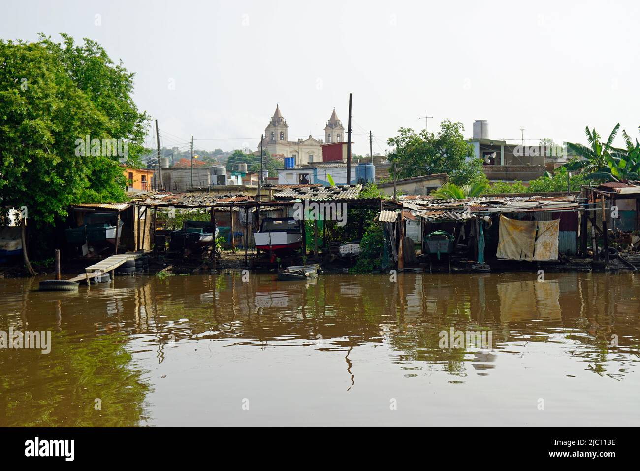 dirty huts near the river in matanzas on cuba Stock Photo - Alamy