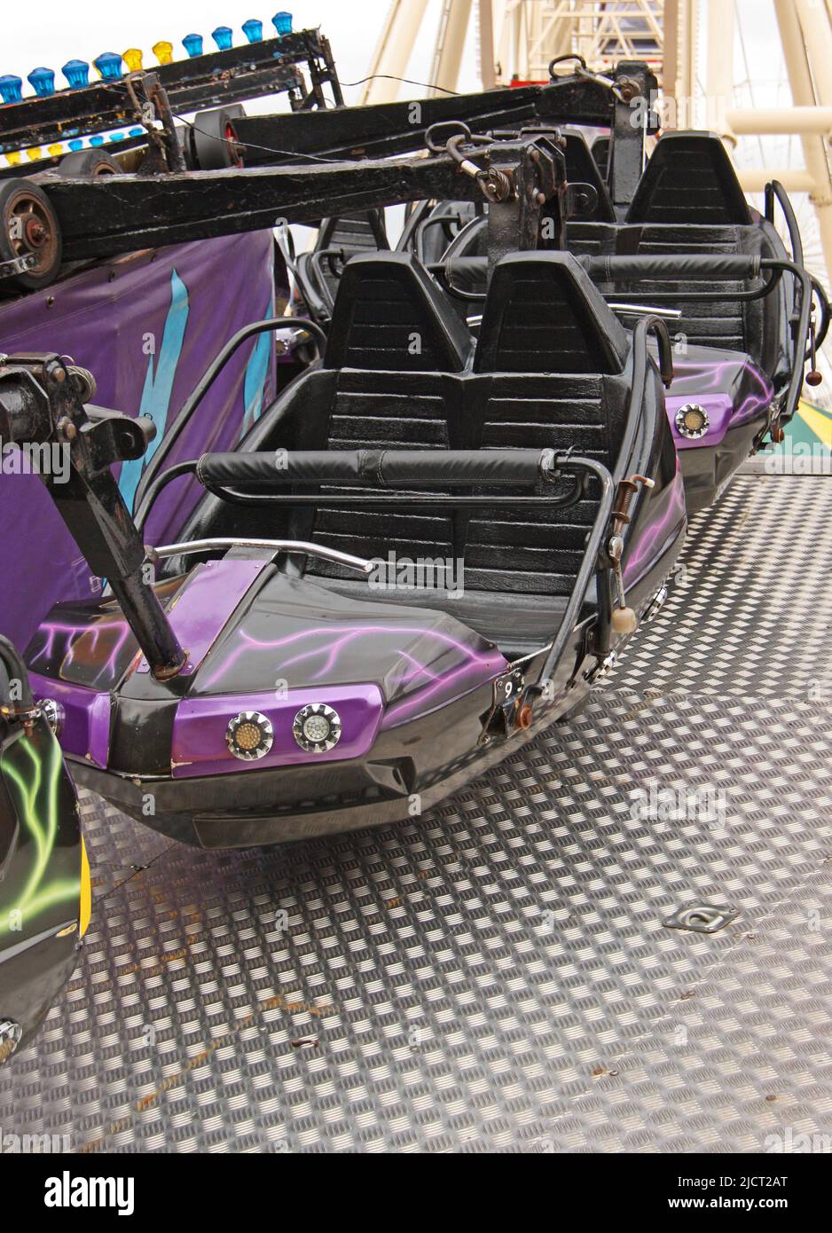 The Carriages and Seats on an Exciting Fun Fair Ride Stock Photo - Alamy