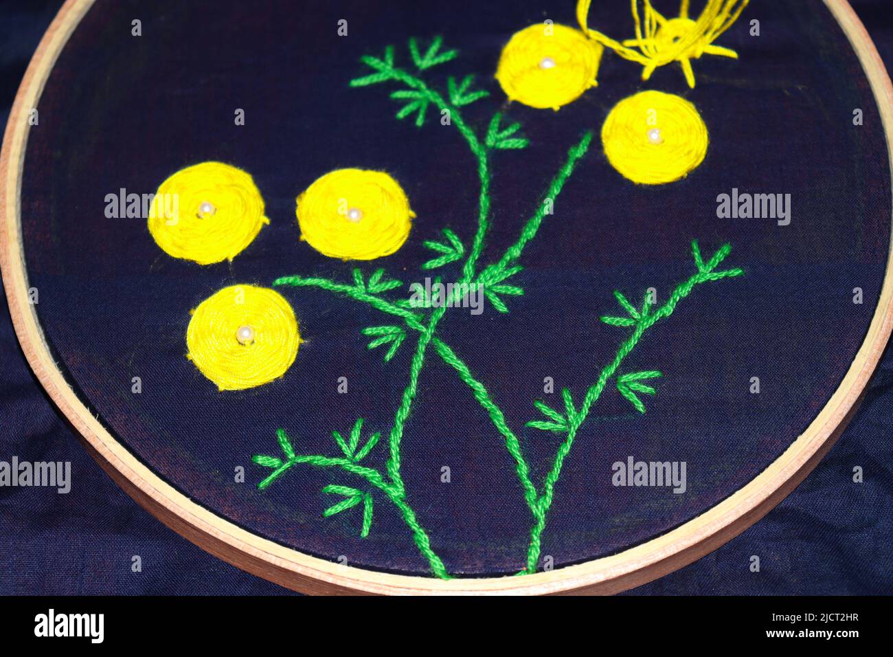 yellow and green colored woolen handicraft sewing embroidery work with ...