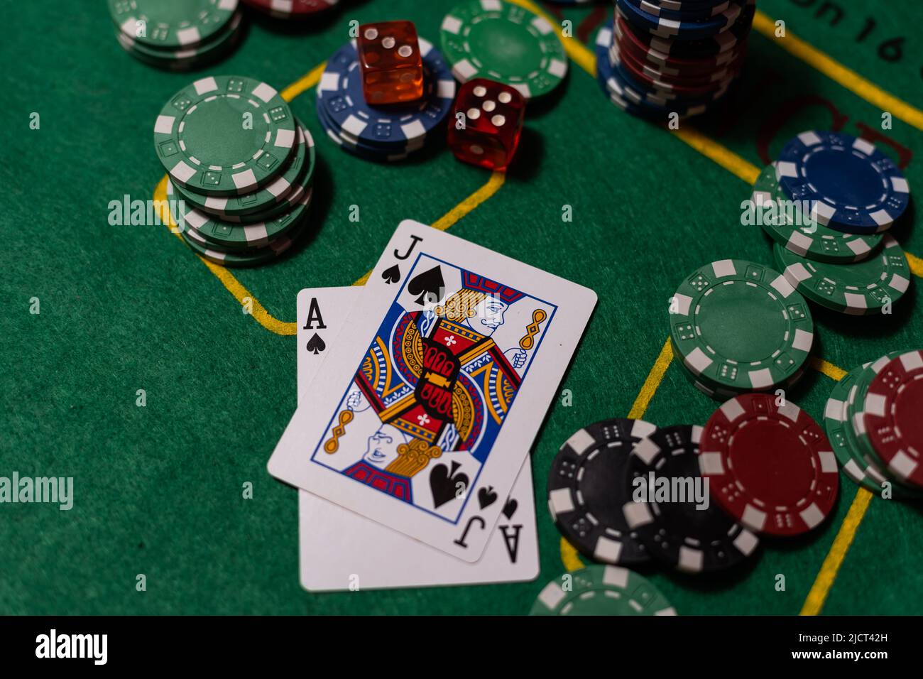 Poker cloth, a deck of cards, poker hand and chips. Background Stock ...