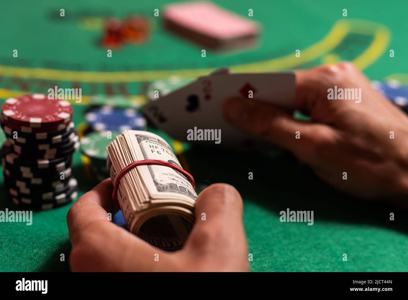 The player makes a bet in poker Stock Photo - Alamy