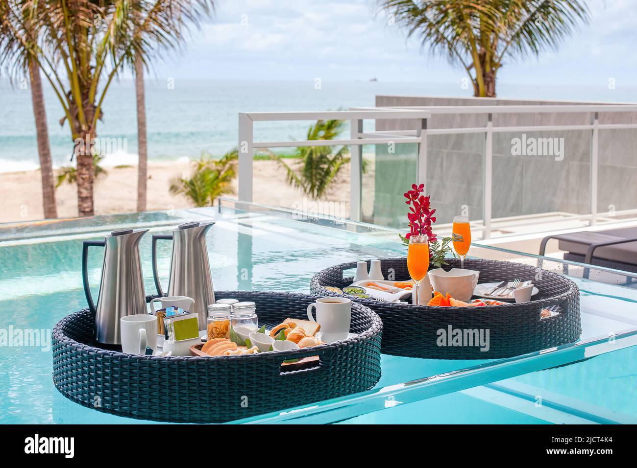 Breakfast in swimming pool, floating breakfast in tropical resort ...