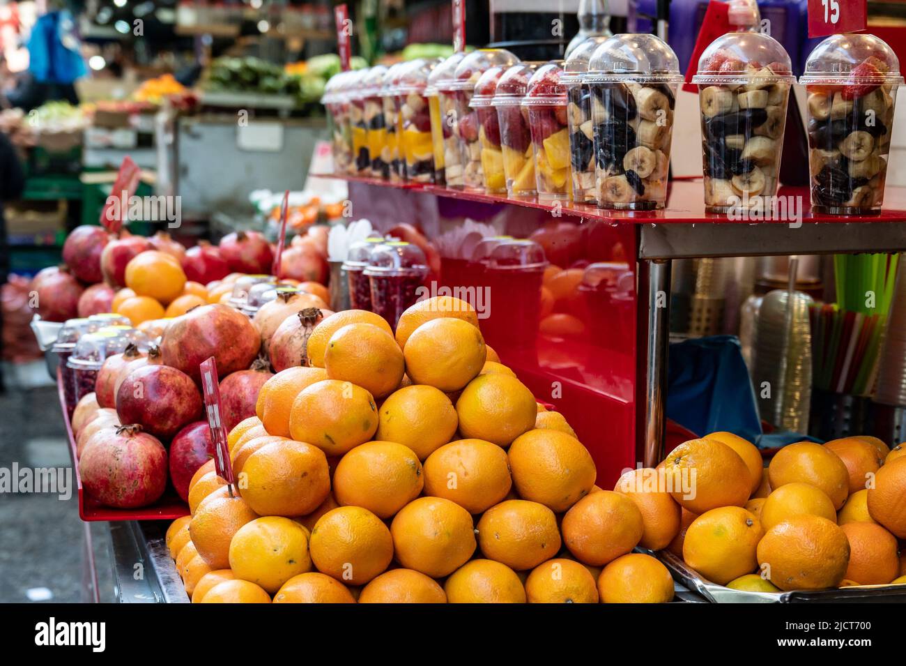Fruits are harvested and stacked on the counter in the market for ...