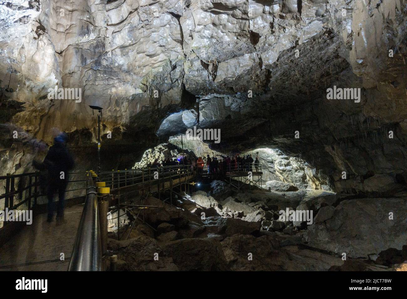 Visitors in hard hats inside Battlefield Cavern in the stunning White ...