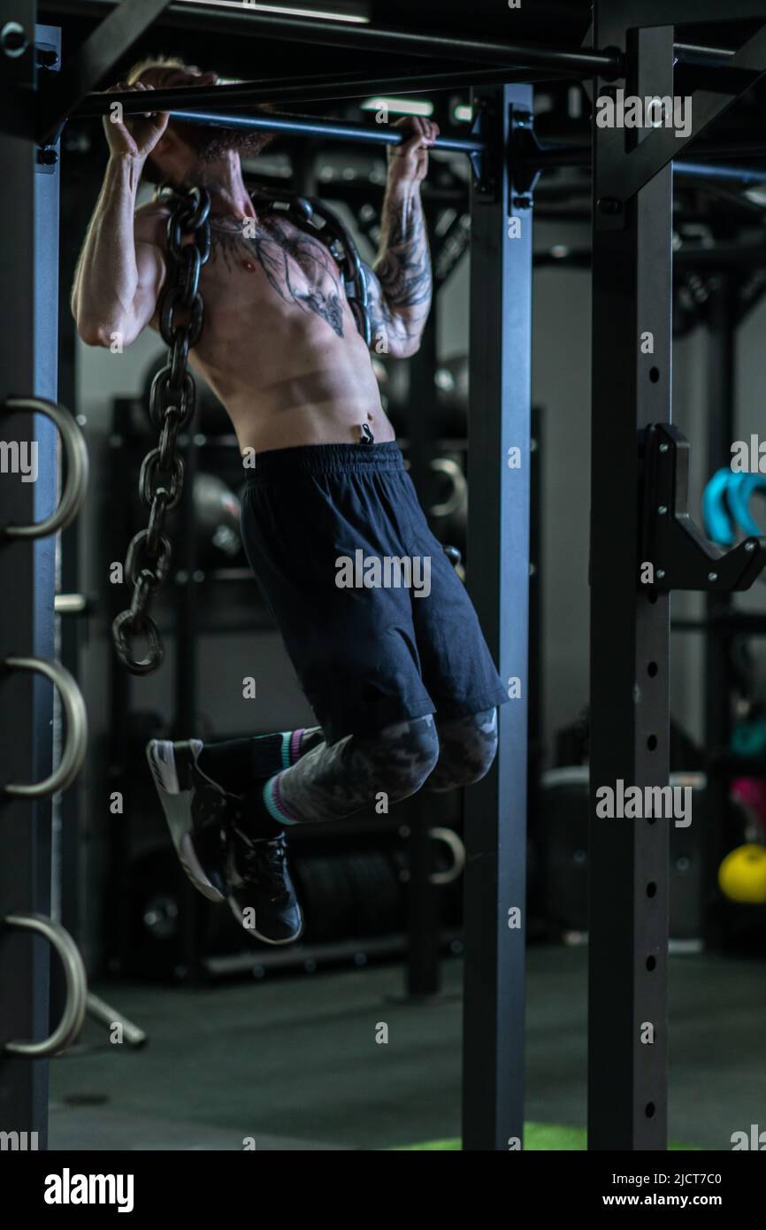 Horizontal weight chain athlete bar man muscular power fitness exercise ...