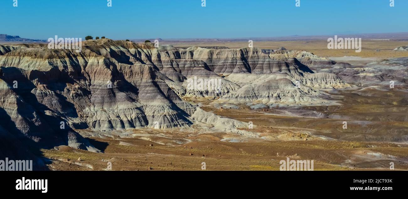 The Painted Desert on a sunny day. Diverse sedimentary rocks and clay ...