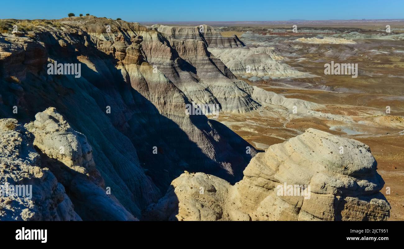 The Painted Desert on a sunny day. Diverse sedimentary rocks and clay ...