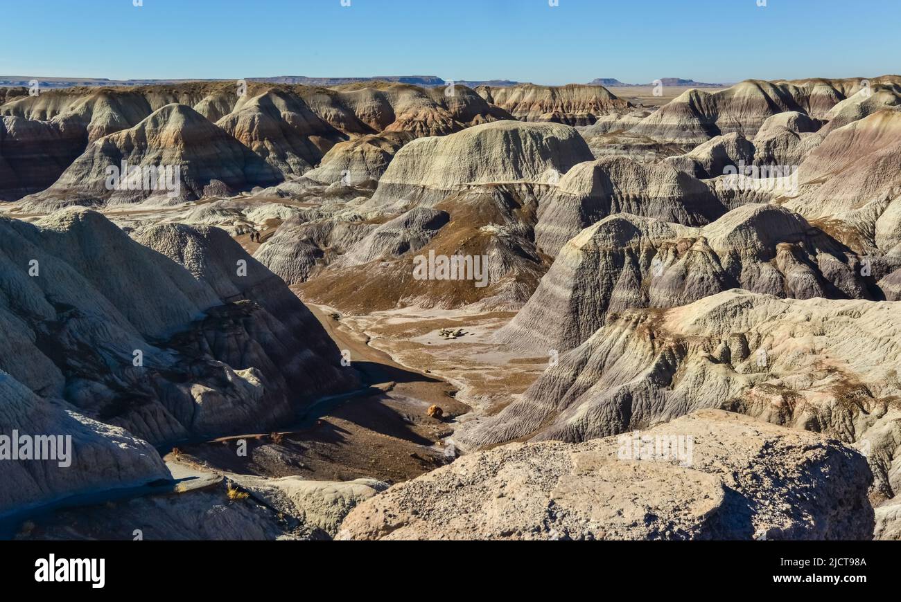 The Painted Desert on a sunny day. Diverse sedimentary rocks and clay ...