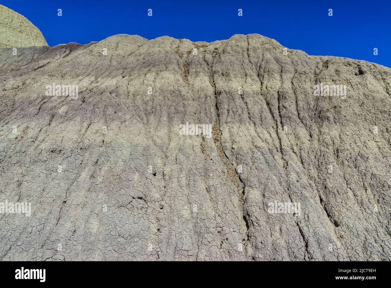 The Painted Desert on a sunny day. Diverse sedimentary rocks and clay ...