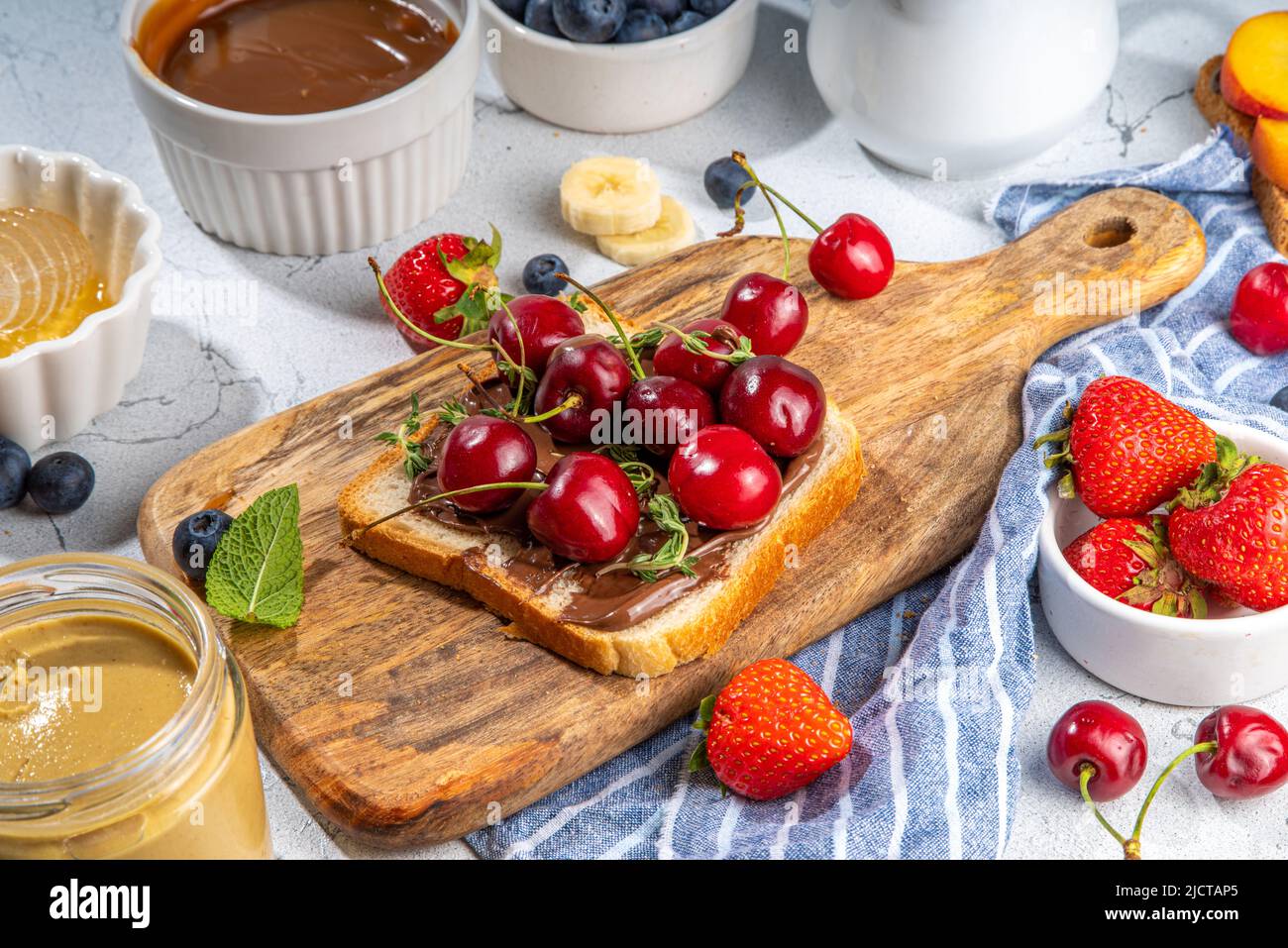 American European summer breakfast sandwiches, toasts with peanut ...