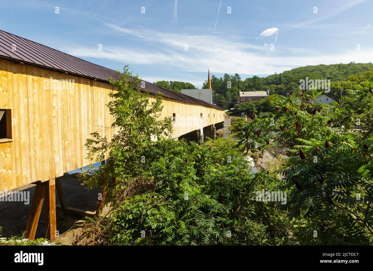 The Bath Covered Bridge in Bath, New Hampshire during the summer months ...