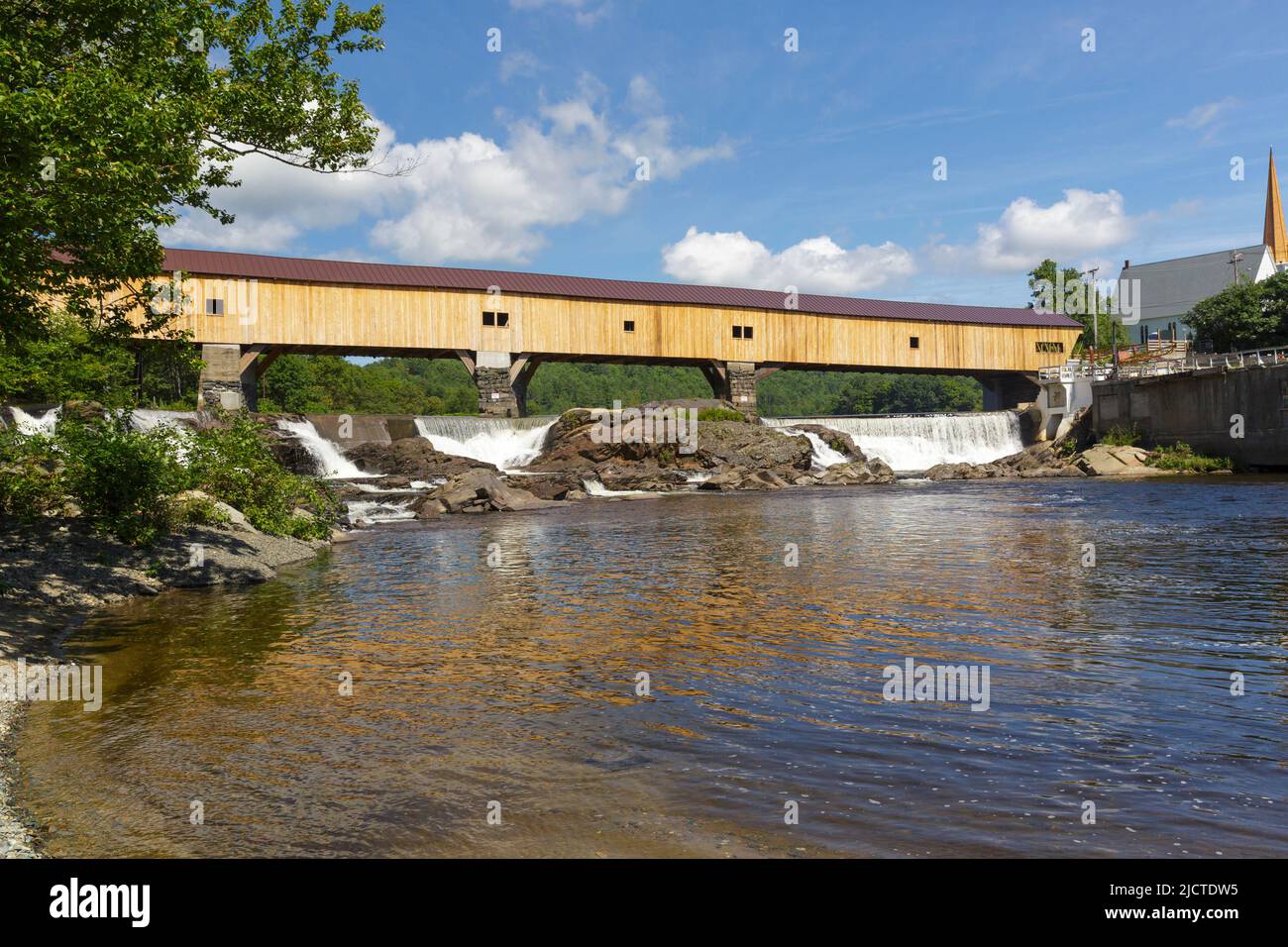 The Bath Covered Bridge in Bath, New Hampshire during the summer months ...