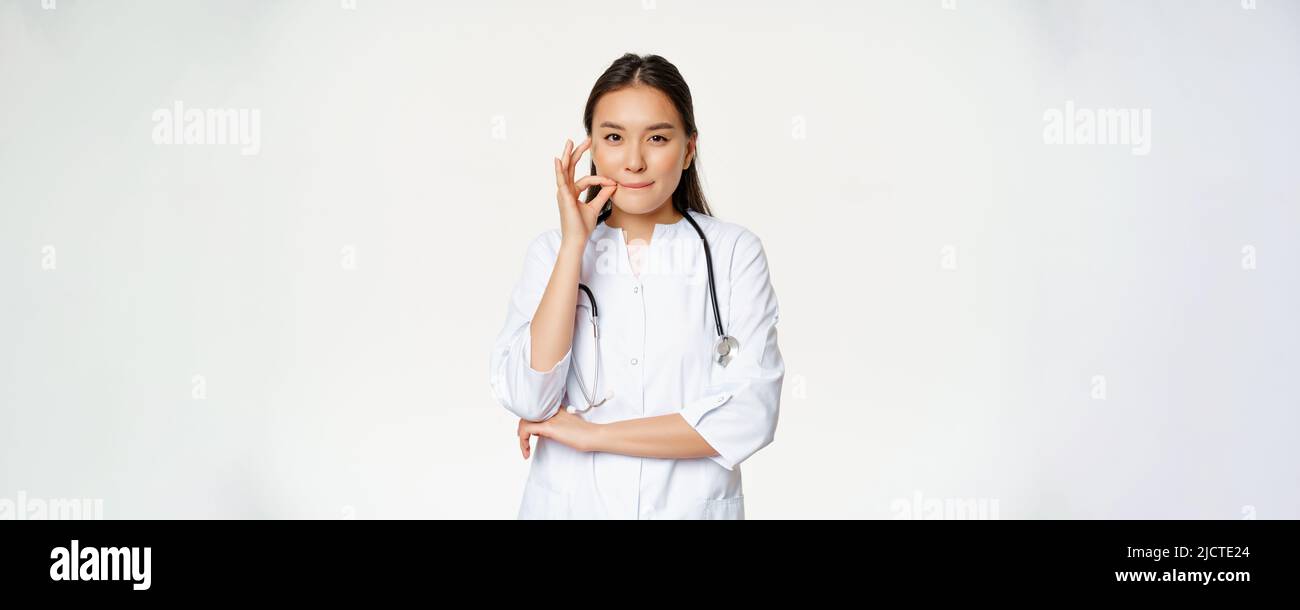 Physician-patient privilege, medical confidentiality. Asian woman ...